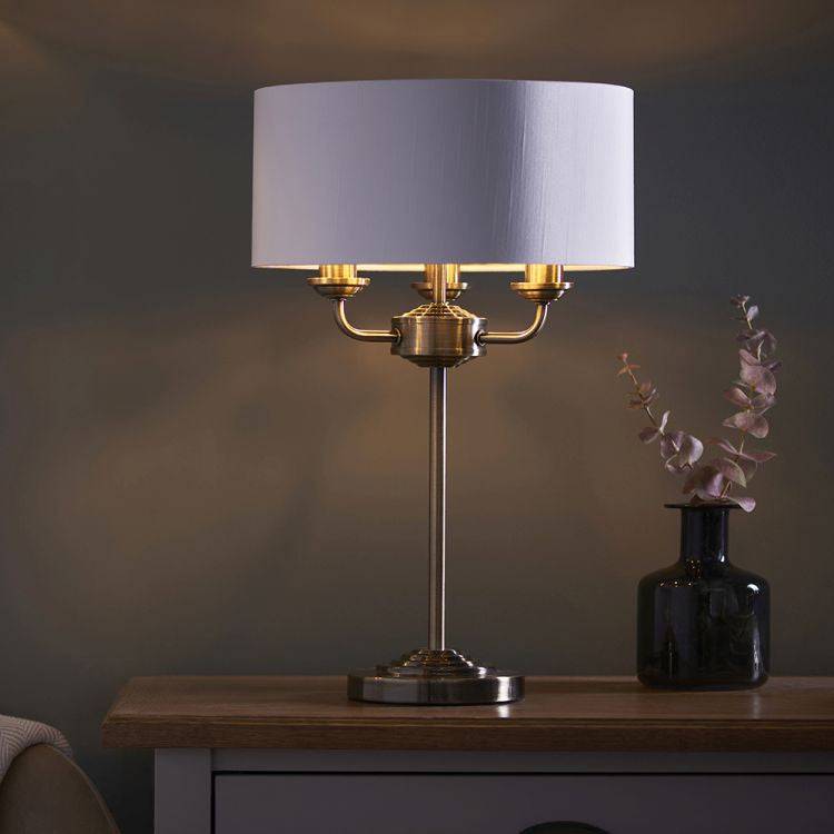 Highclere 3Lt Table Lamp Antique Brass – Comet Lighting